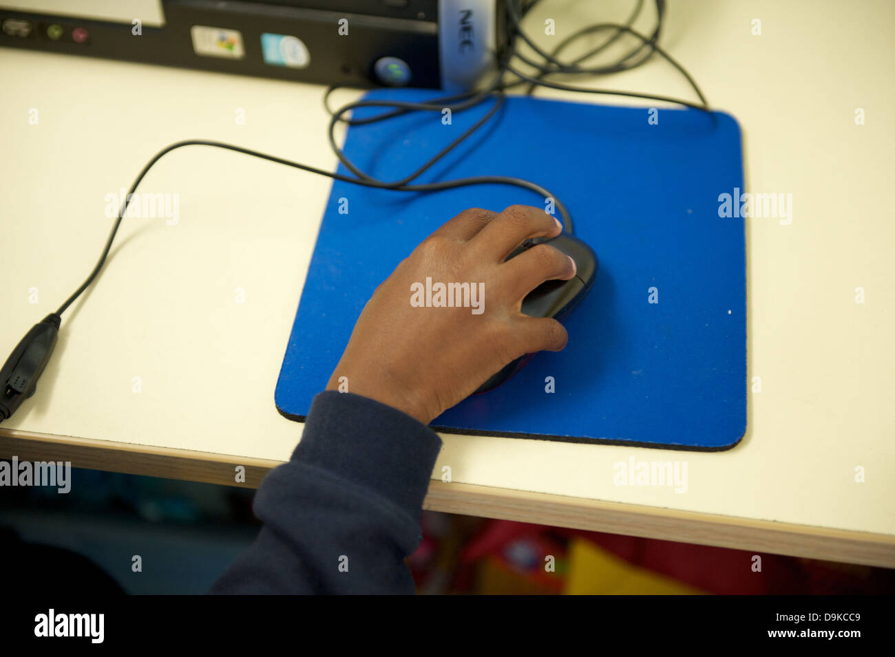 Child's hand and mouse hi-res stock photography and images - Alamy