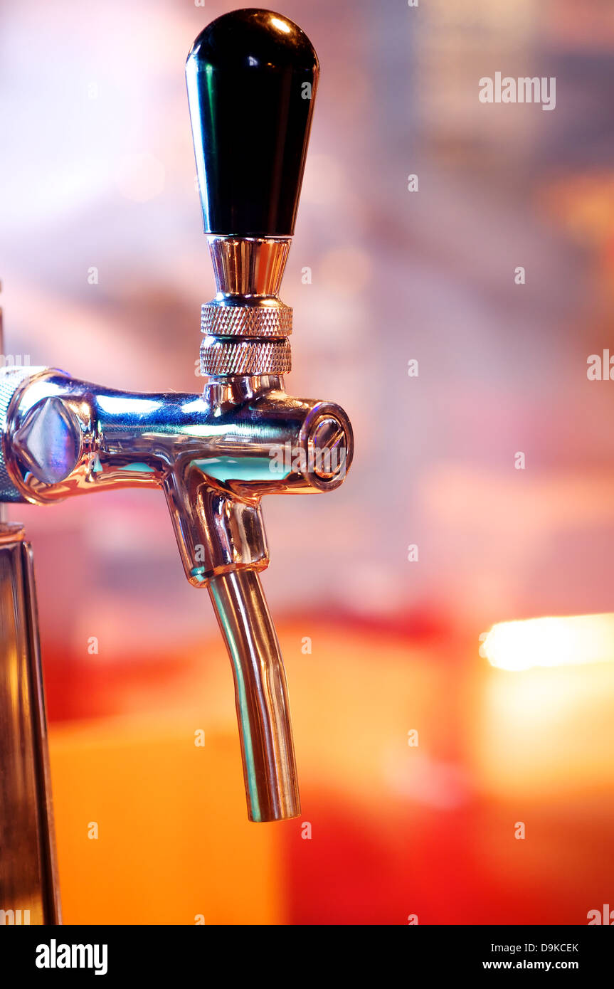 Beer tap close up background Stock Photo - Alamy
