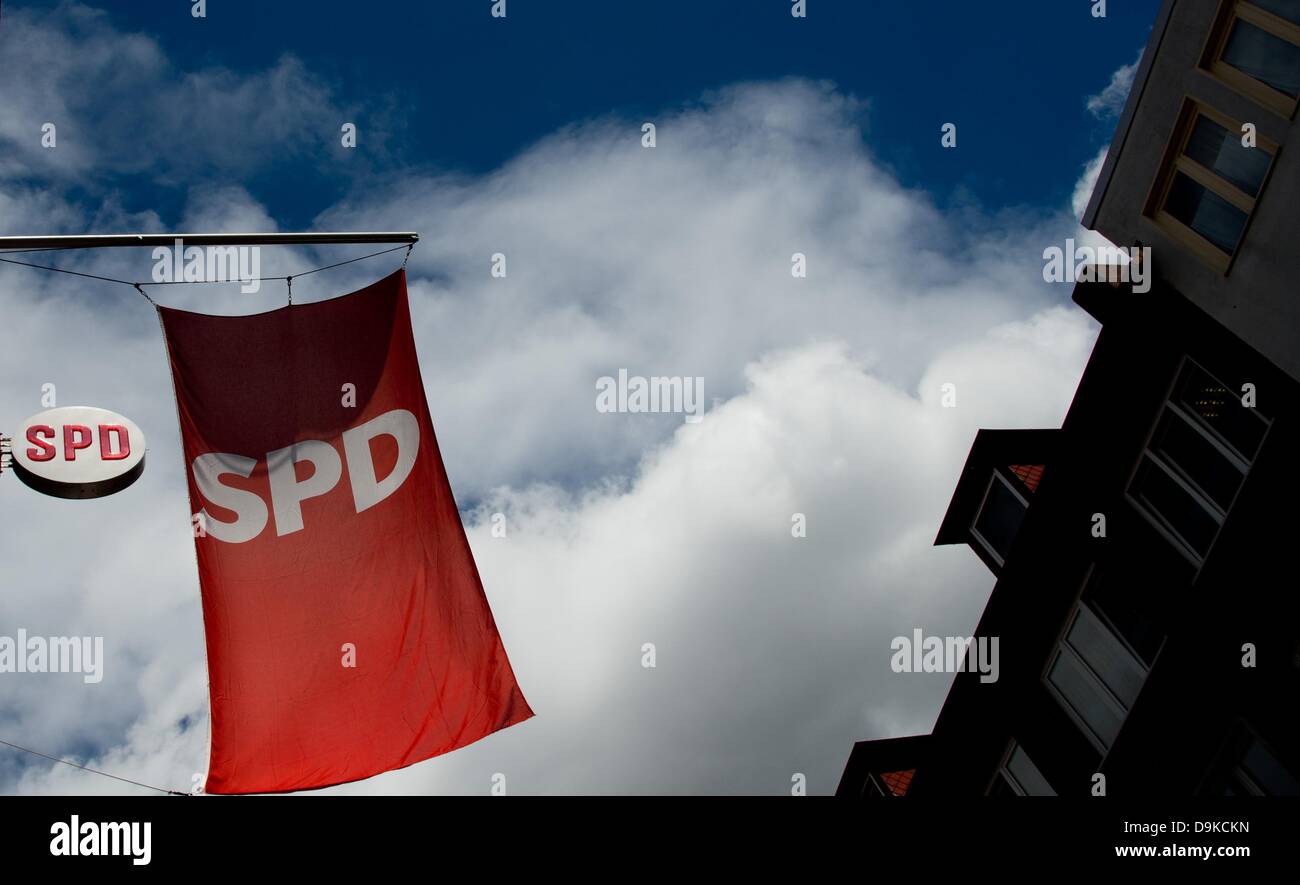 A sign and a flag with the logo of the Social Democratic Party of ...