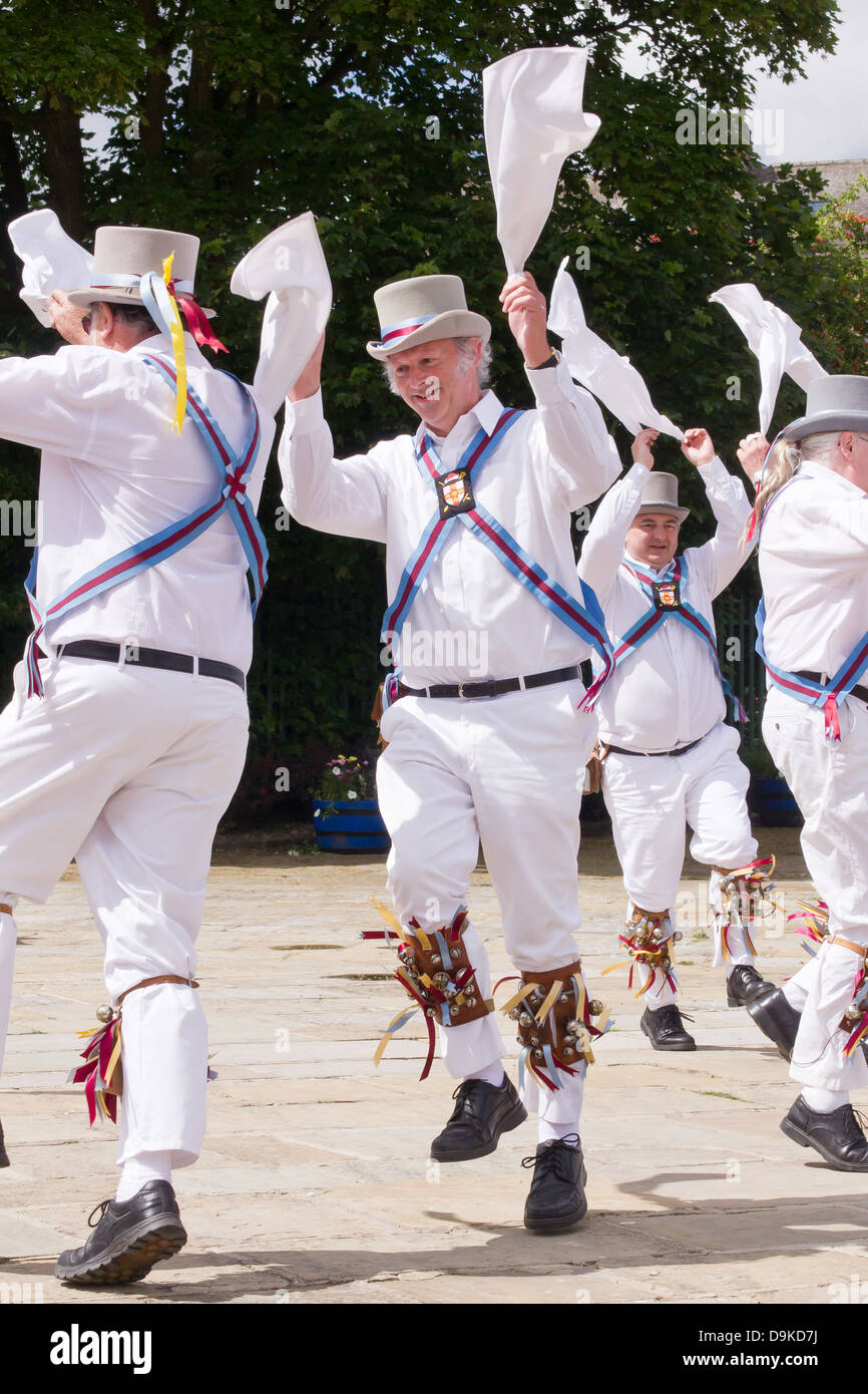 Male Morris dancers jumping with hankies at Skipton, north Yorkshire ...