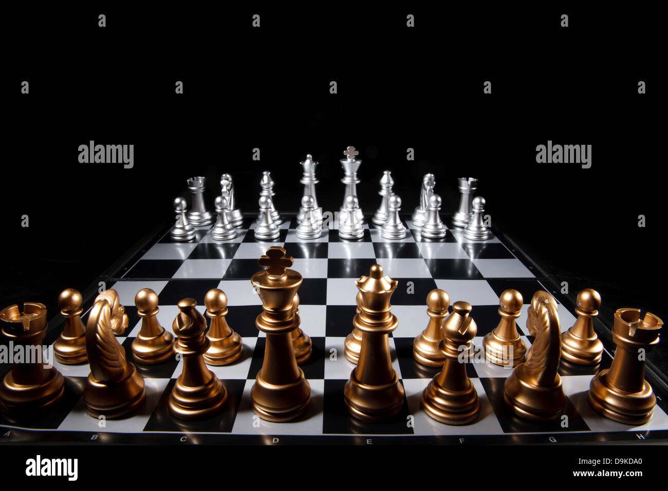 Chess isolated on black Stock Photo - Alamy