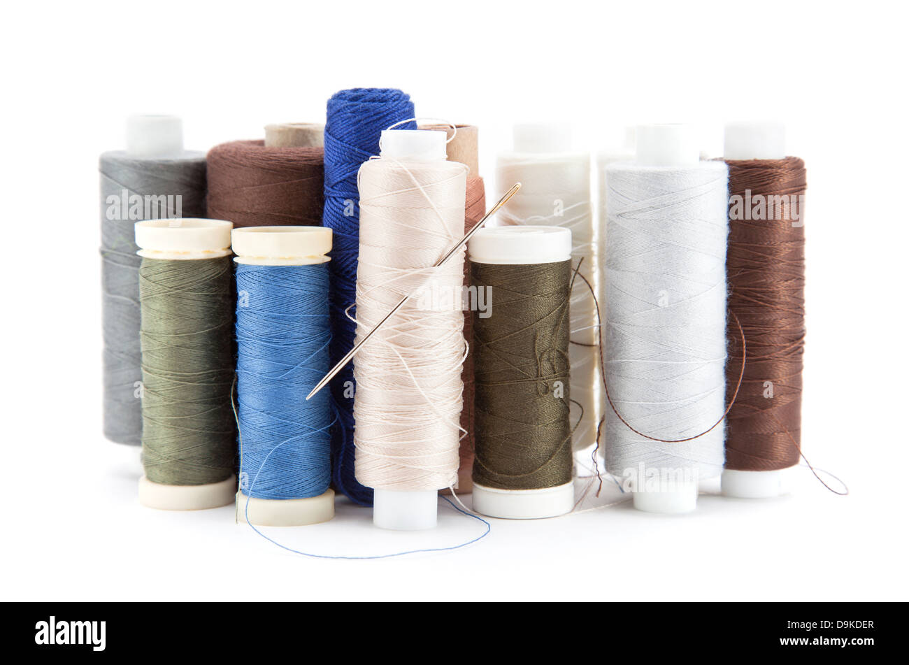 Spools of thread isolated on white Stock Photo - Alamy