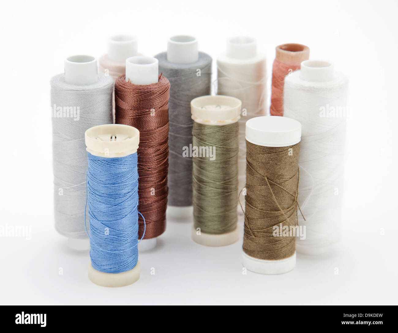 Spools of thread isolated on white Stock Photo - Alamy