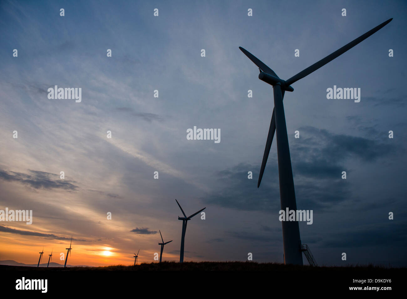 Sun set over Carno 2 wind farm, Powys, Mid Wales, UK Stock Photo - Alamy