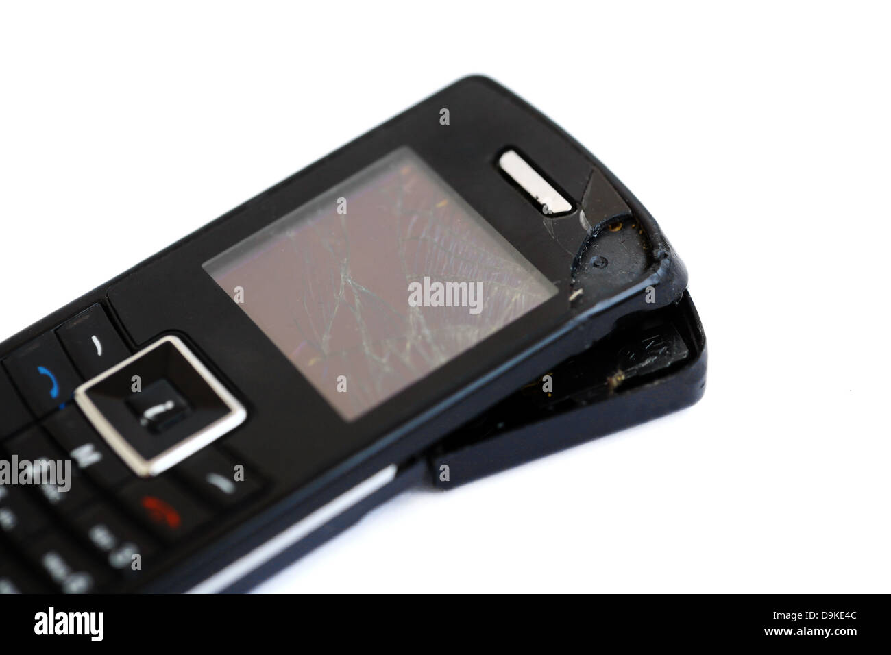 A broken old mobile phone isolated on white Stock Photo - Alamy