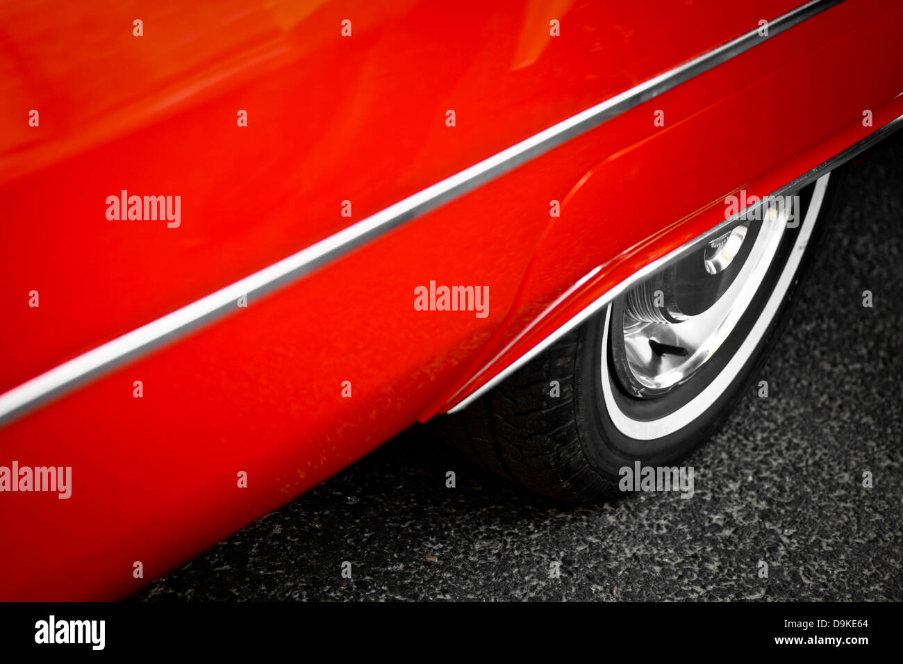 Detail of the back wheel of a vintage red car Stock Photo - Alamy