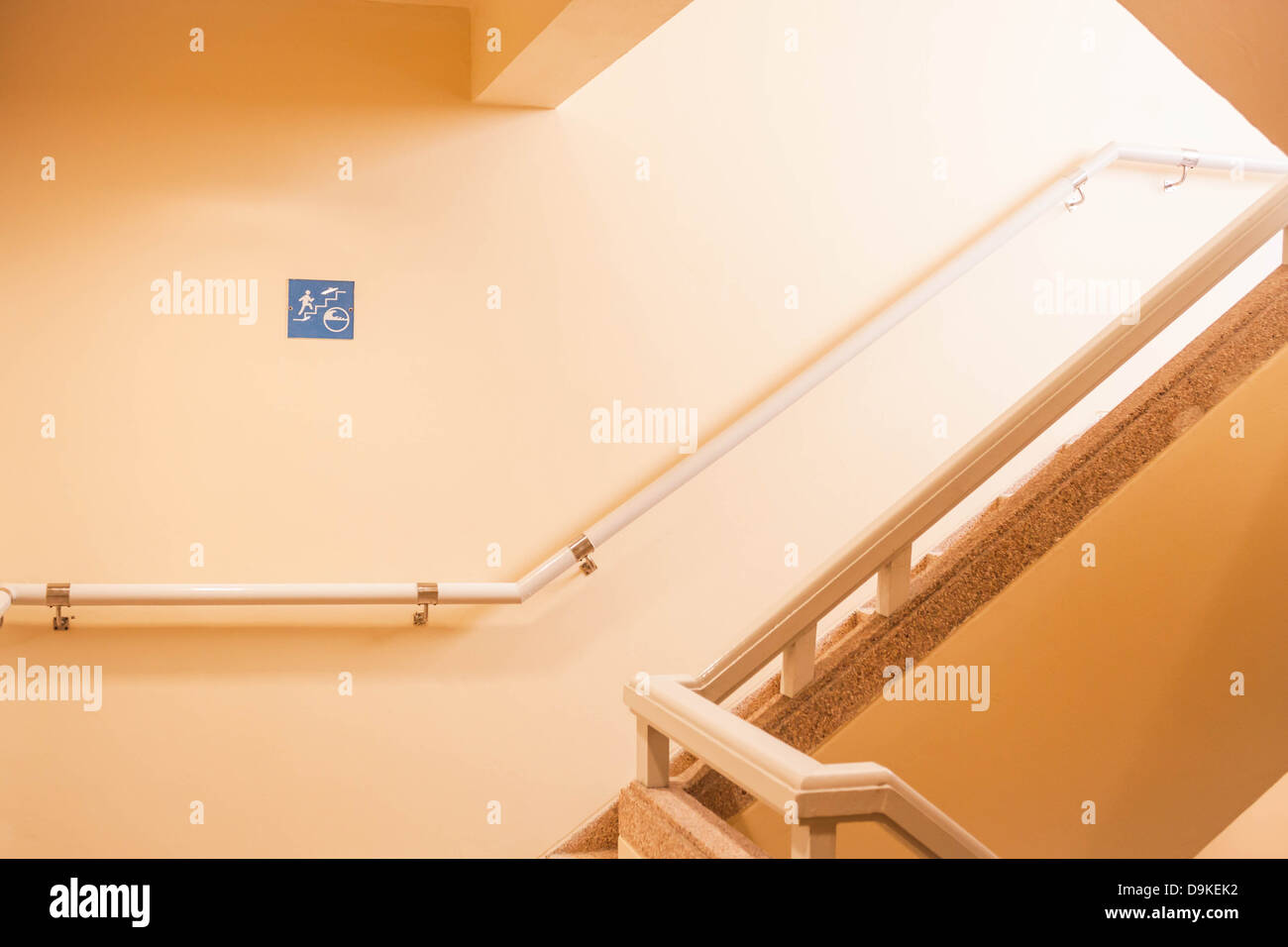 Tsunami escape stairwell behind a tall building Stock Photo - Alamy