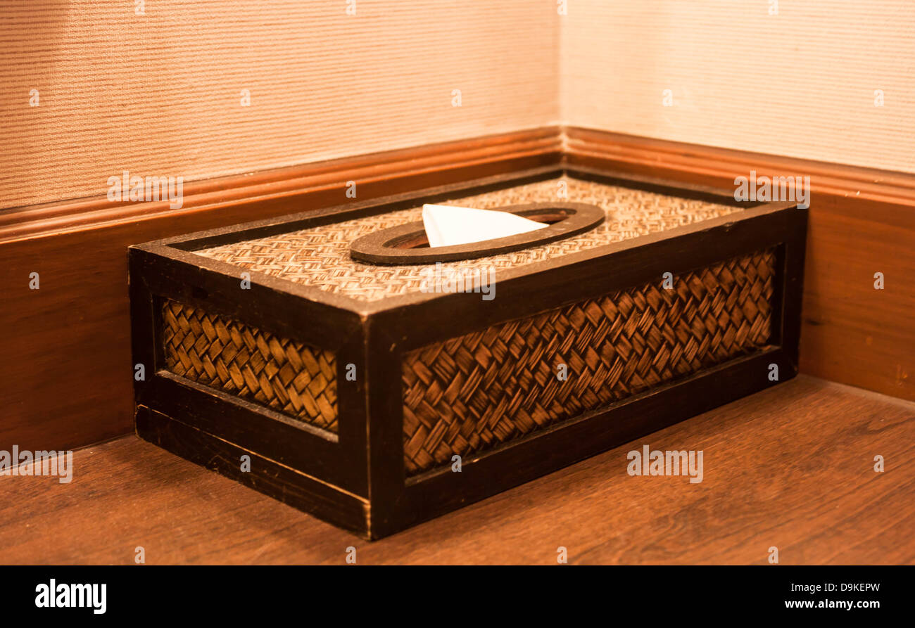 Facial tissue paper in craft box on wood table Stock Photo - Alamy