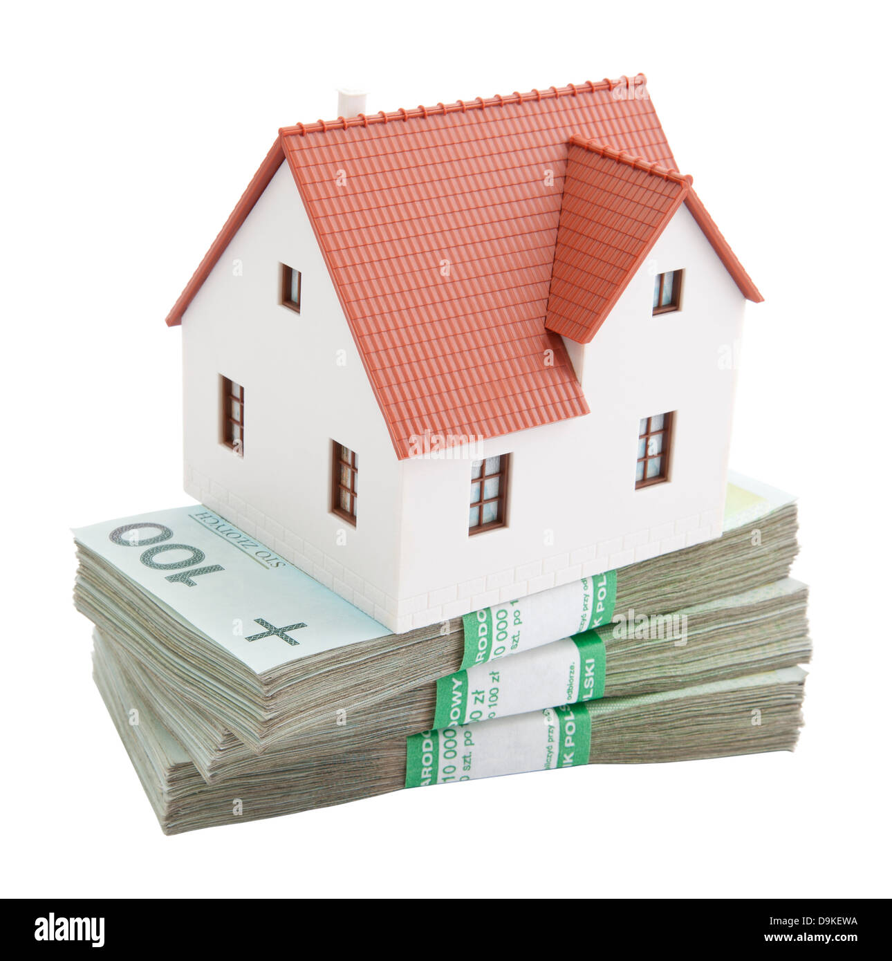 House on stack of polish zlotys Stock Photo - Alamy