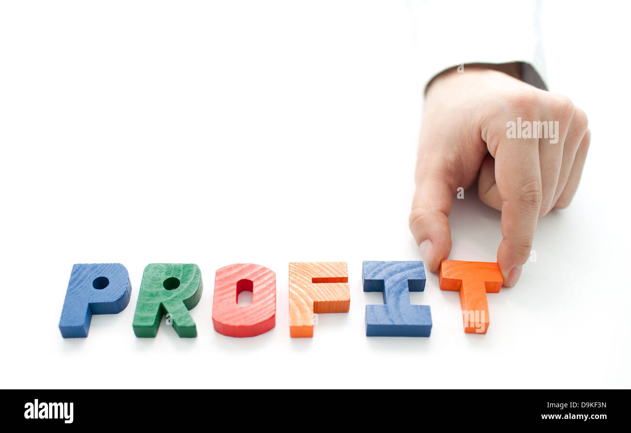Hand and word Profit on white background Stock Photo - Alamy