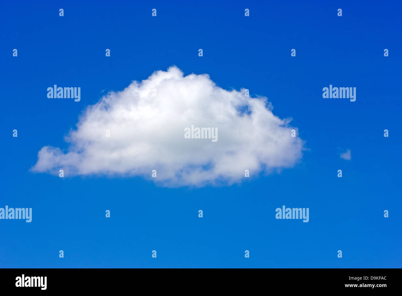 Single white cloud in a blue sky Stock Photo - Alamy