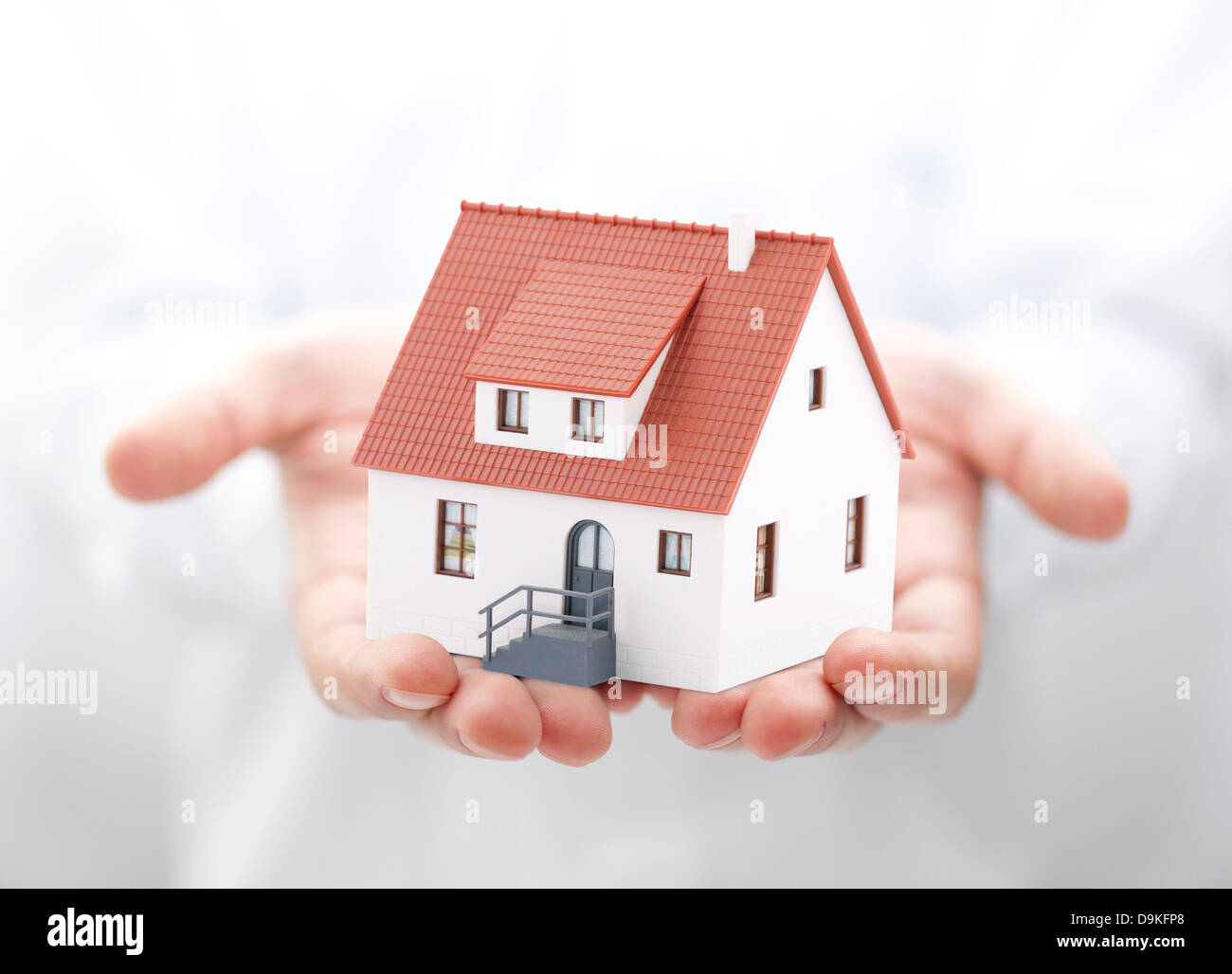 House in hands Stock Photo - Alamy