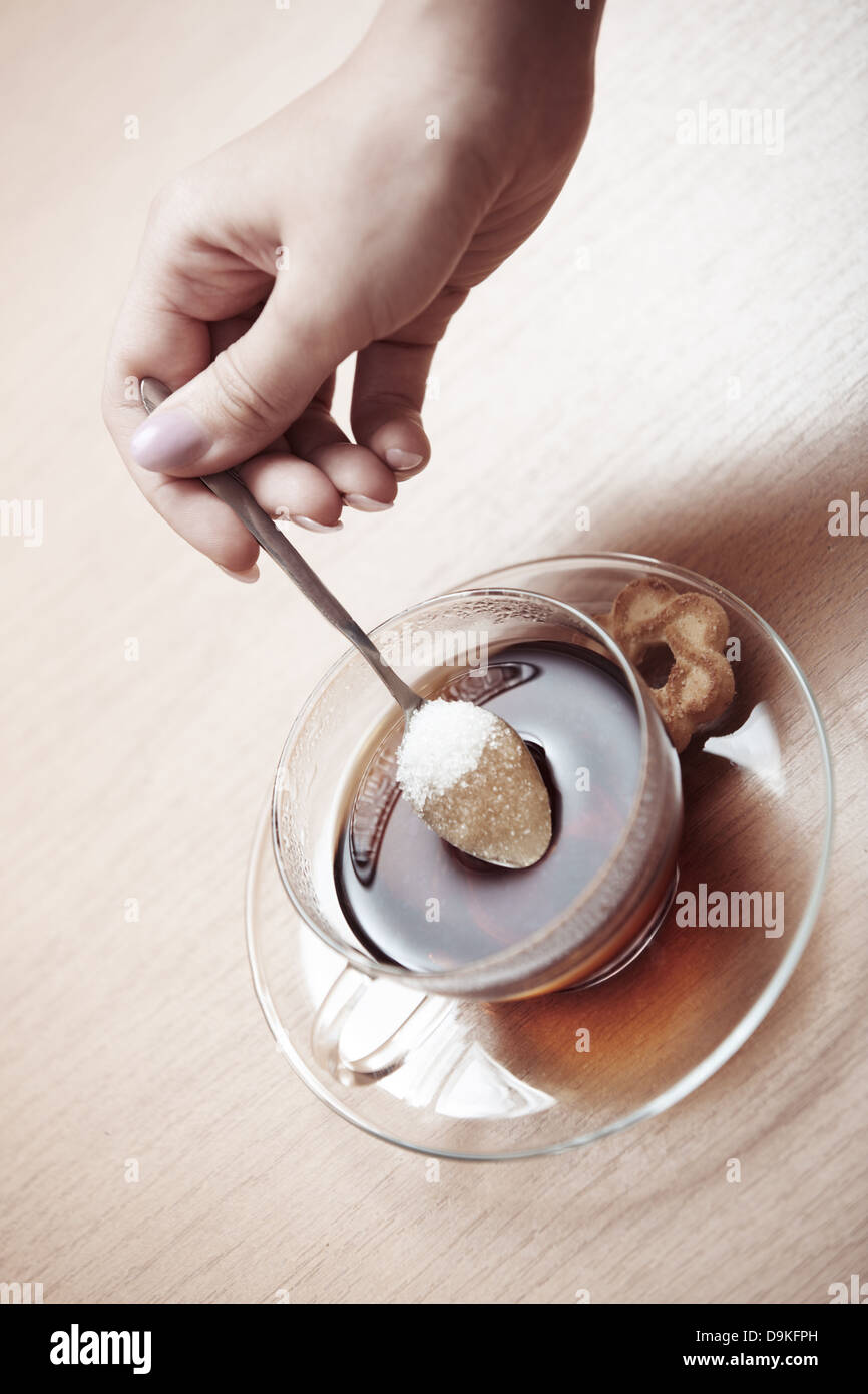 Teaspoon sugar woman hi-res stock photography and images - Alamy