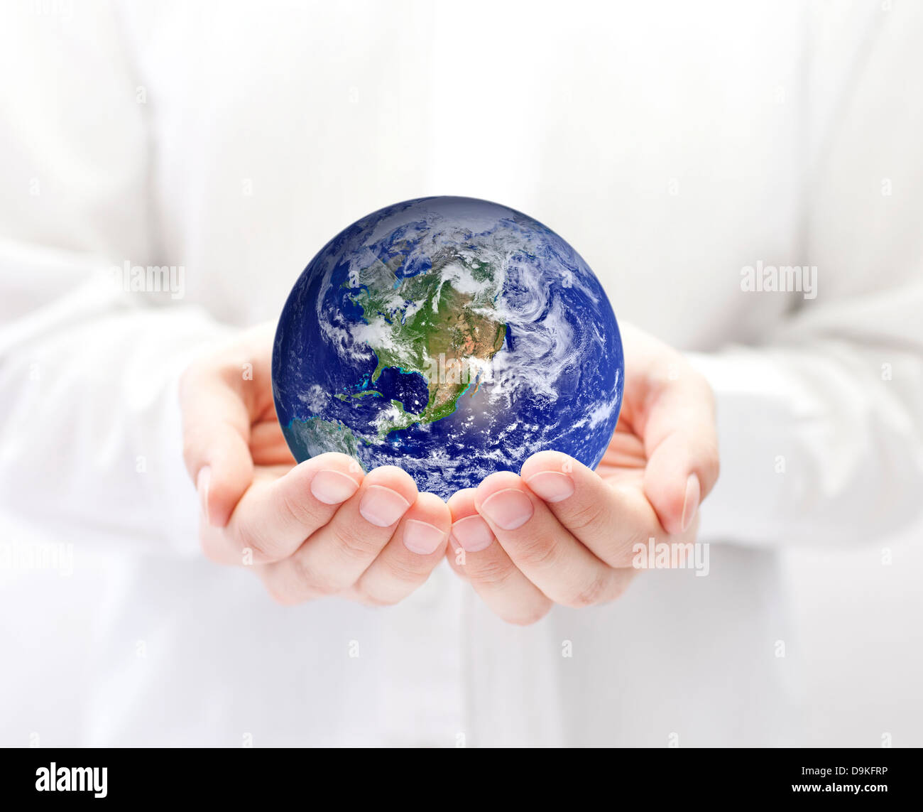 Earth in hands. Earth image provided by Nasa Stock Photo - Alamy