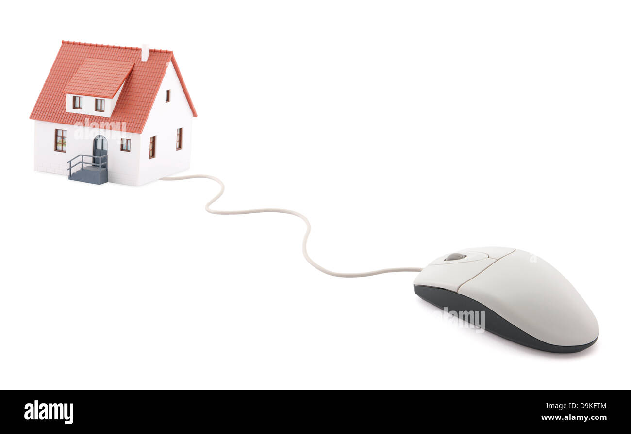 Small house connected to computer mouse Stock Photo - Alamy