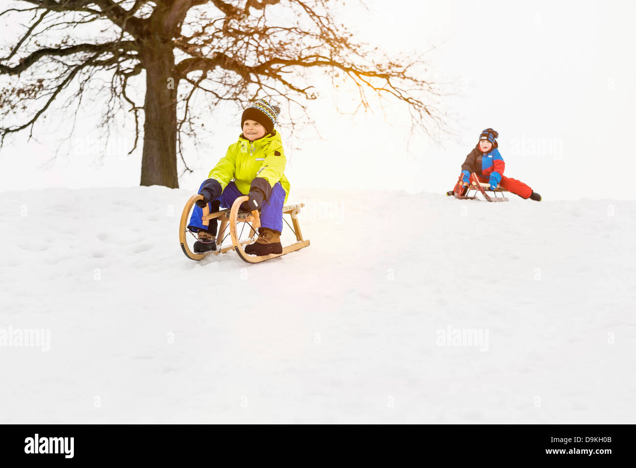 Two boys playing in the snow hi-res stock photography and images - Alamy
