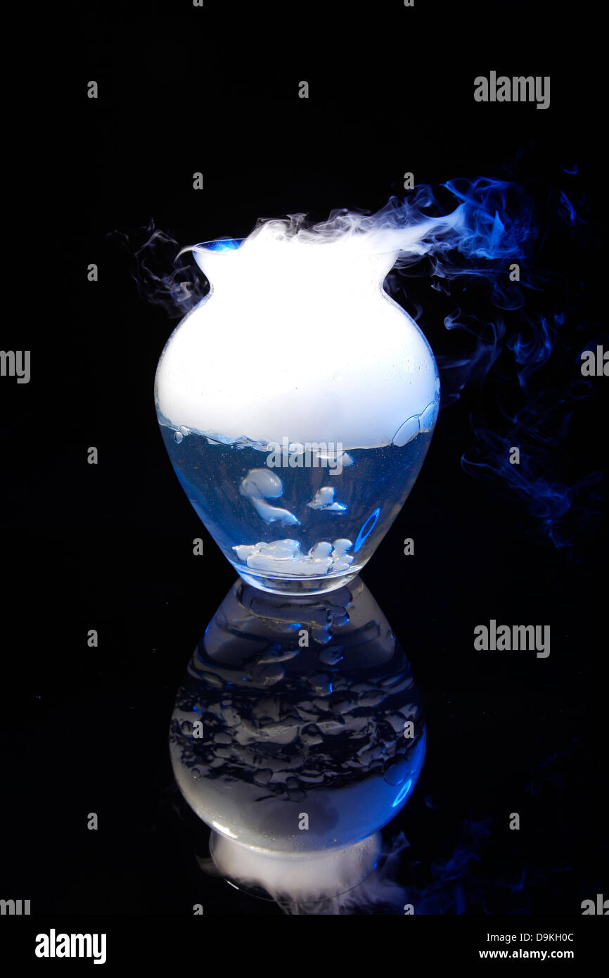 glass with the effect of dry ice Stock Photo - Alamy