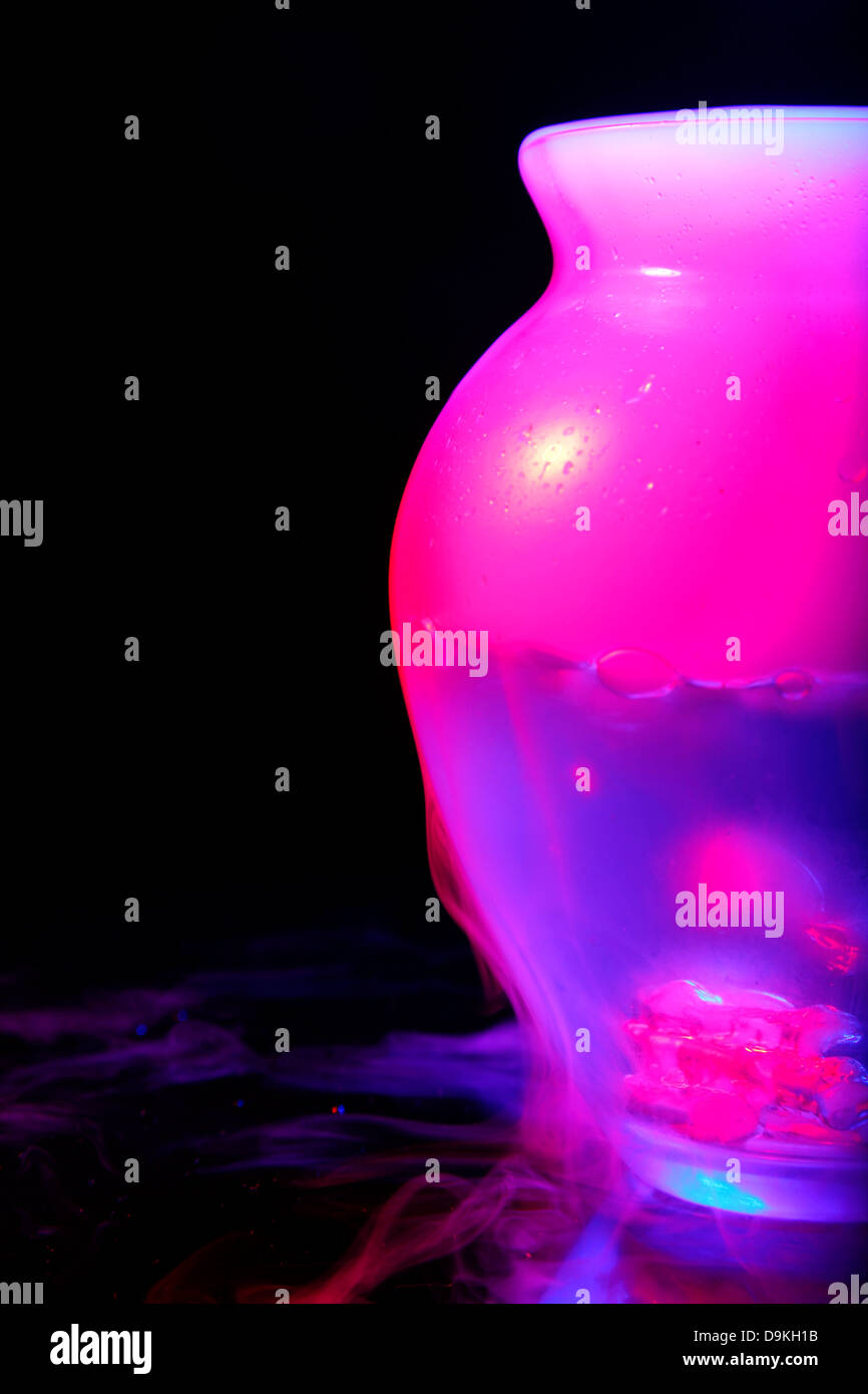 glass with the effect of dry ice Stock Photo - Alamy
