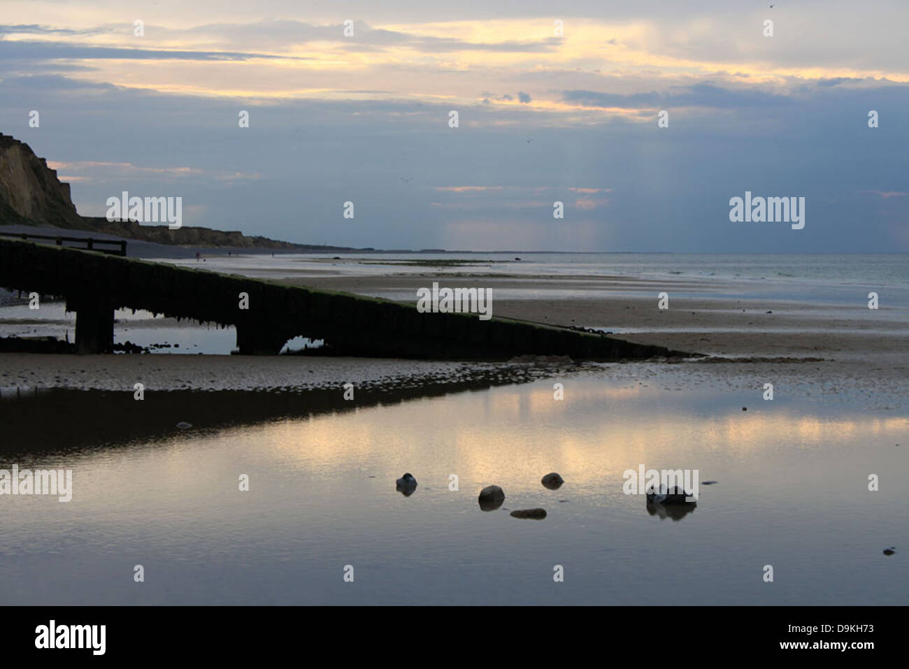 A Boat Ramp on a beach at sunset Stock Photo - Alamy