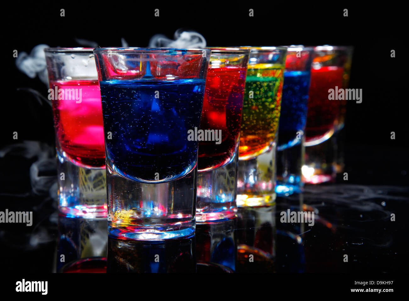 Several alcohol shots Stock Photo - Alamy