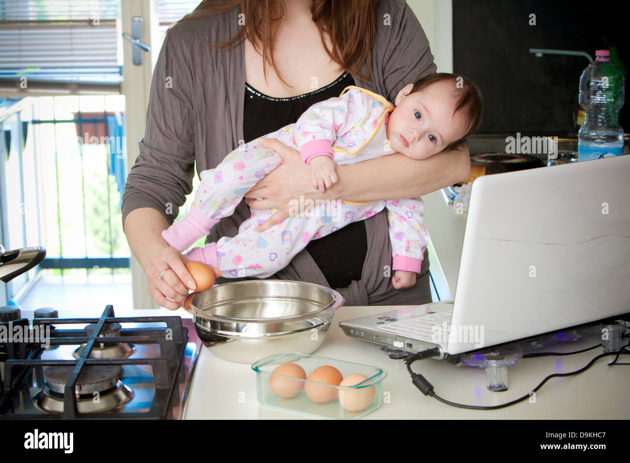 Multitasking Woman Cooking High Resolution Stock Photography and Images ...