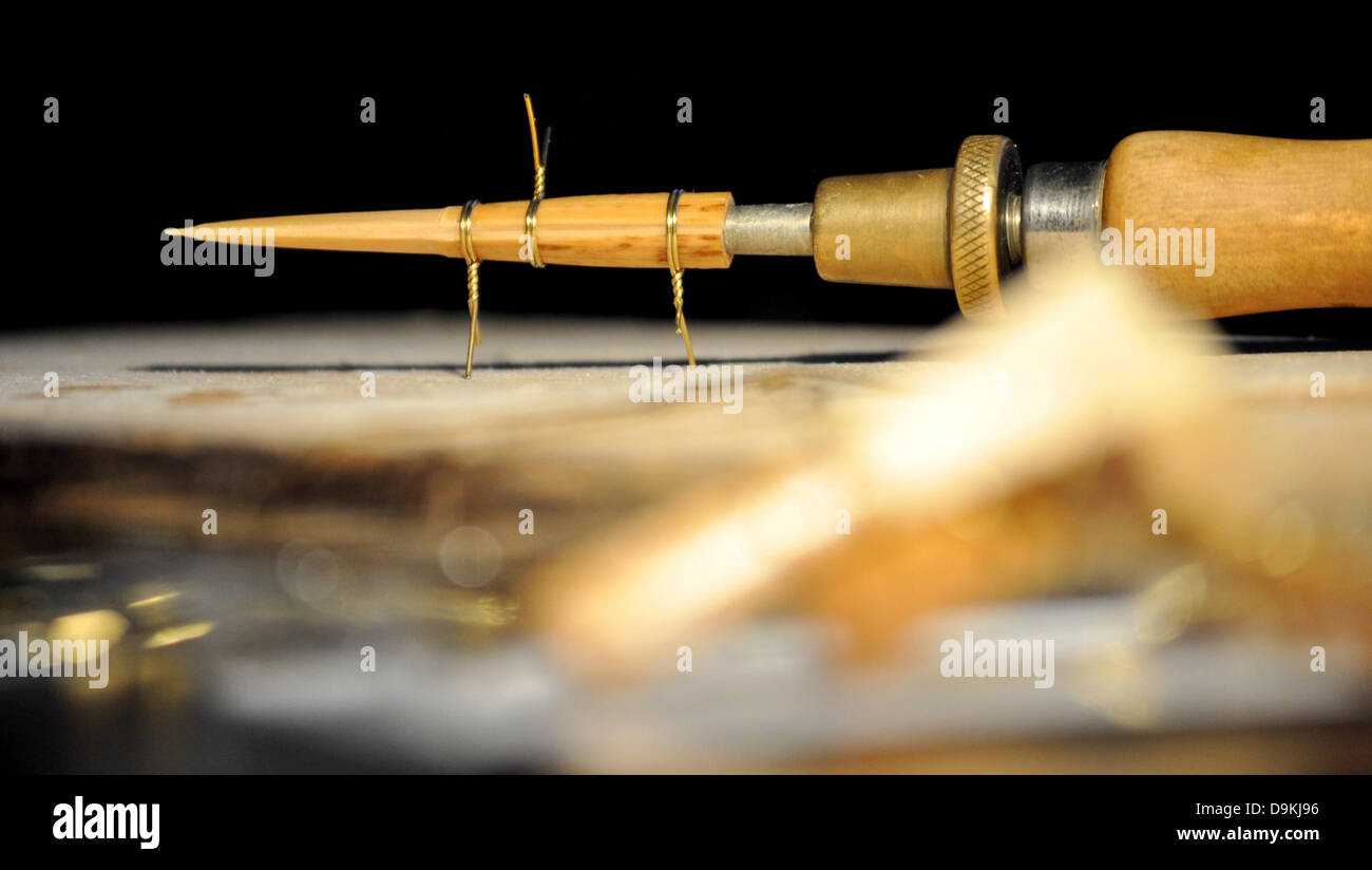 Bassoon reeds before drying on the rack Stock Photo - Alamy