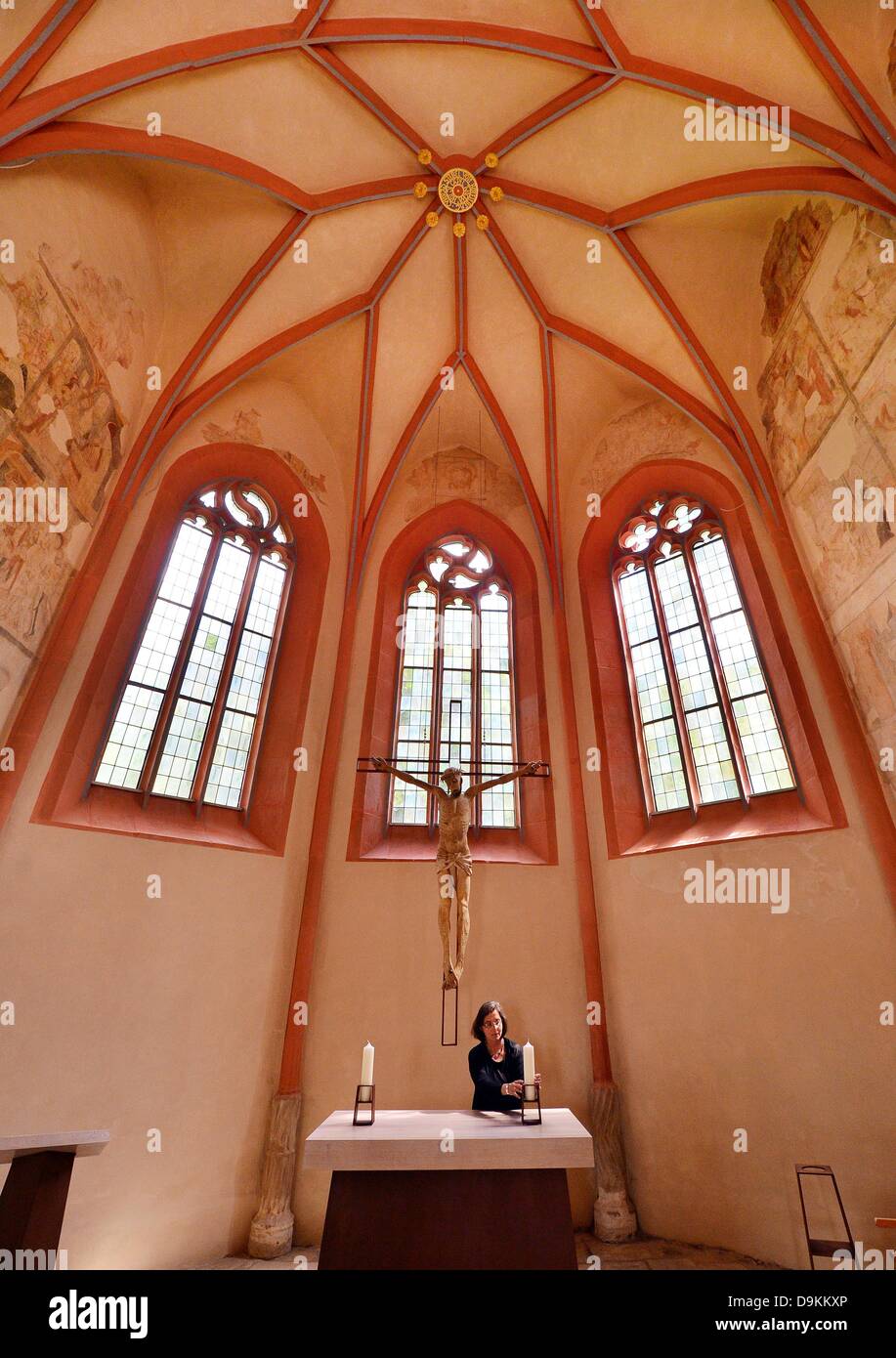 Pastor Susanne-Maria Breustedt prepares the altar for the inauguration ...