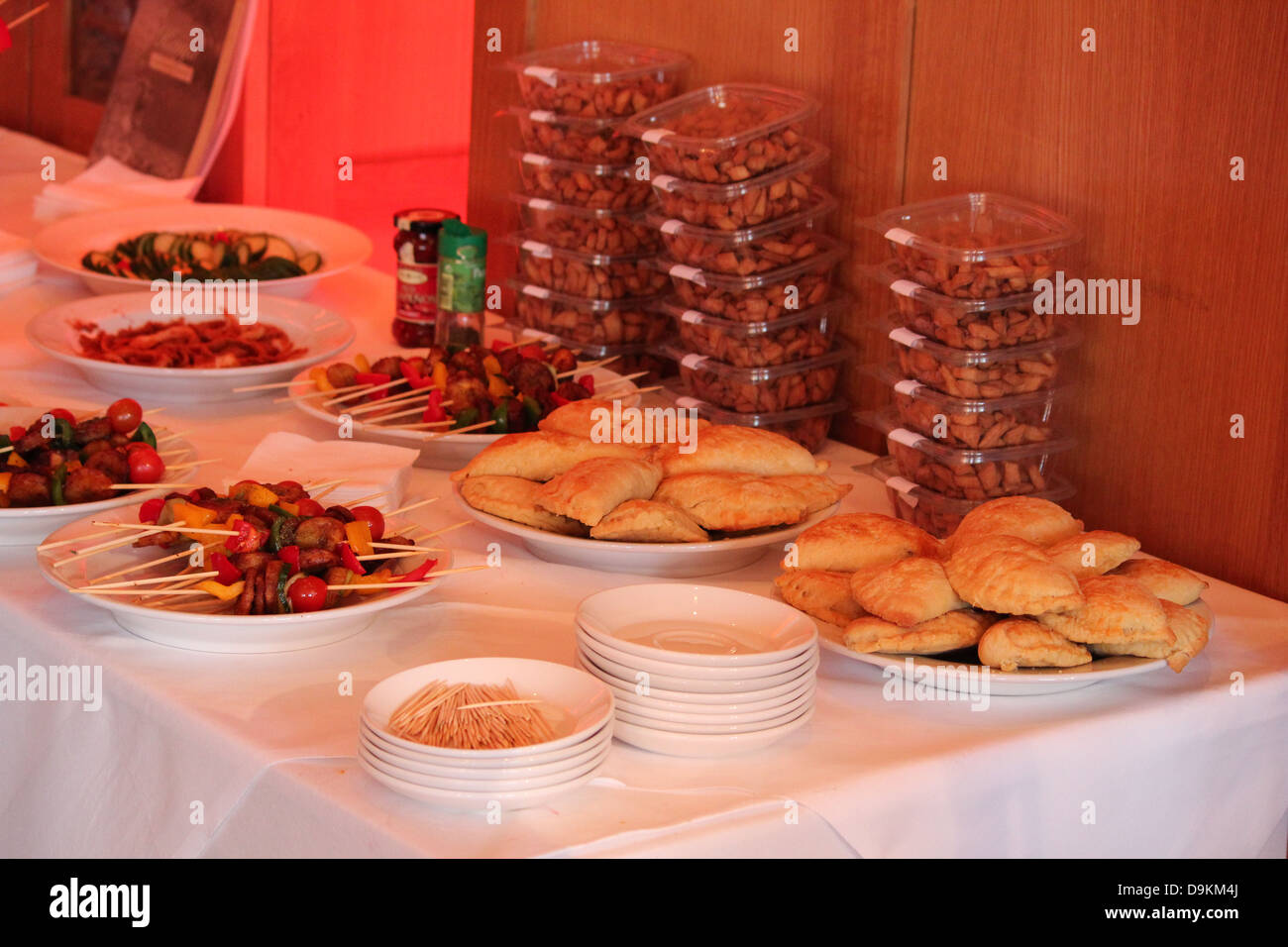 Pictured is a table with colorful food Stock Photo - Alamy