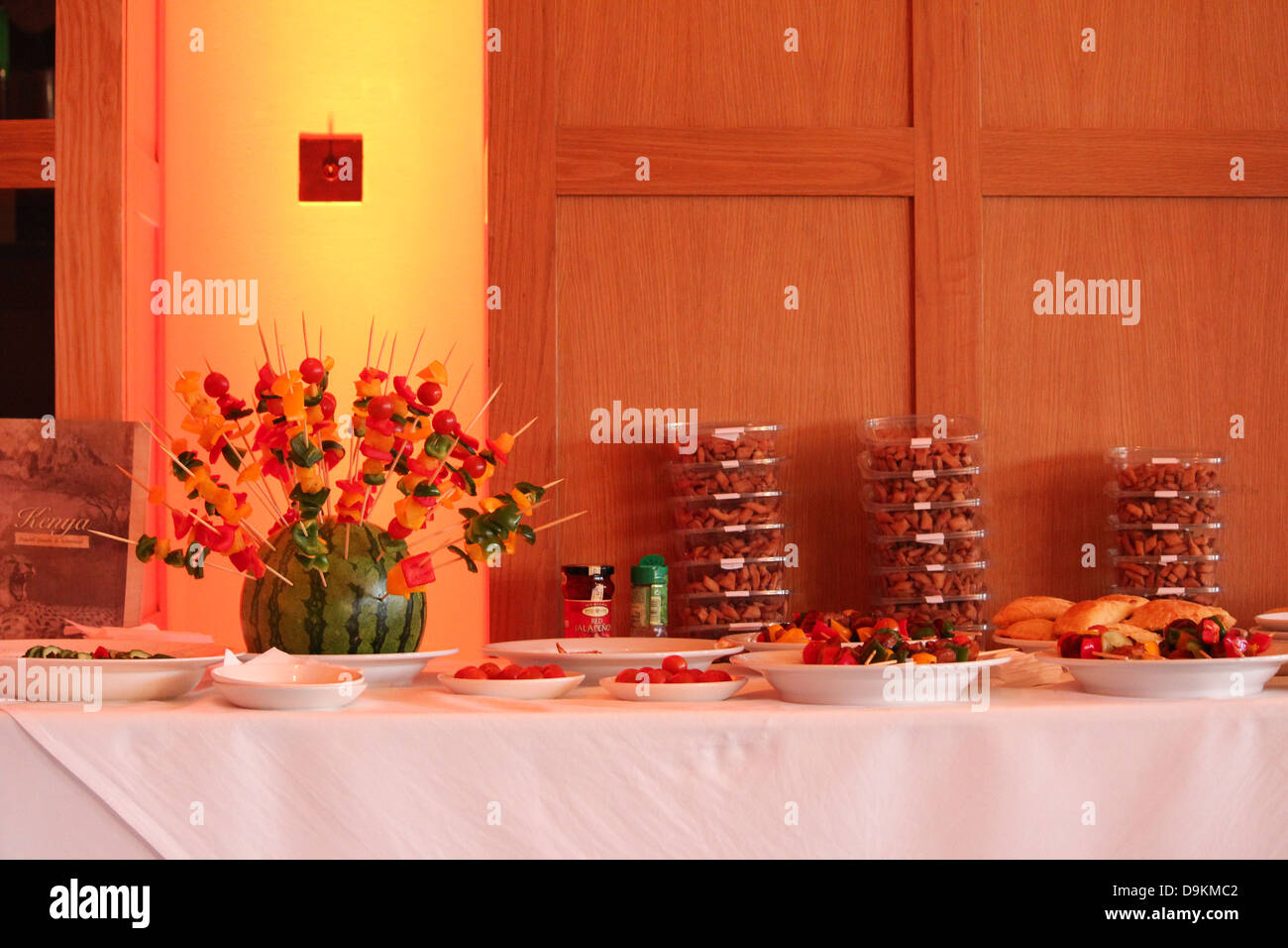 Pictured is a table with colorful food Stock Photo - Alamy
