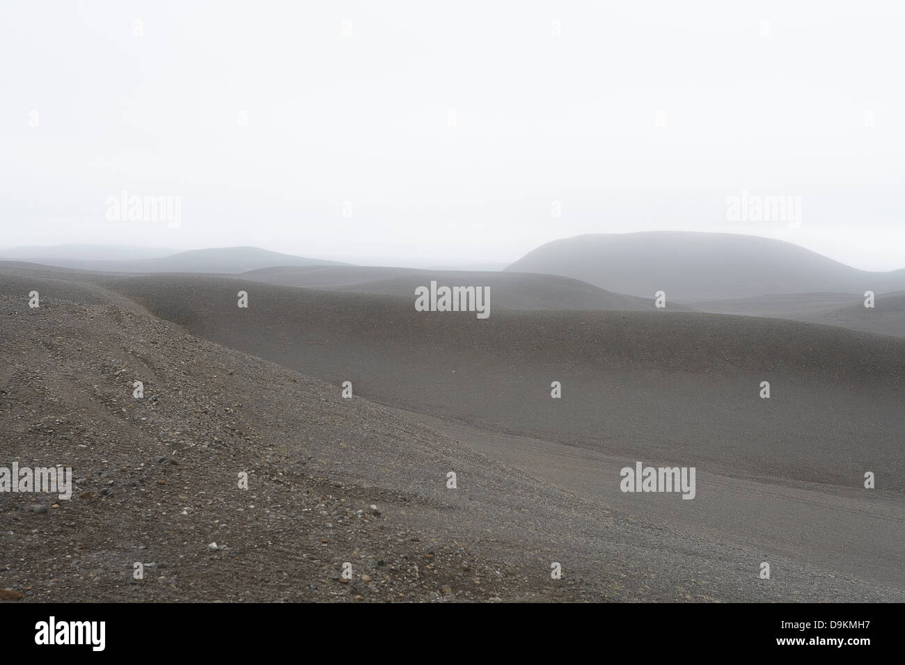 Grey misty hills in empty landscape Stock Photo - Alamy
