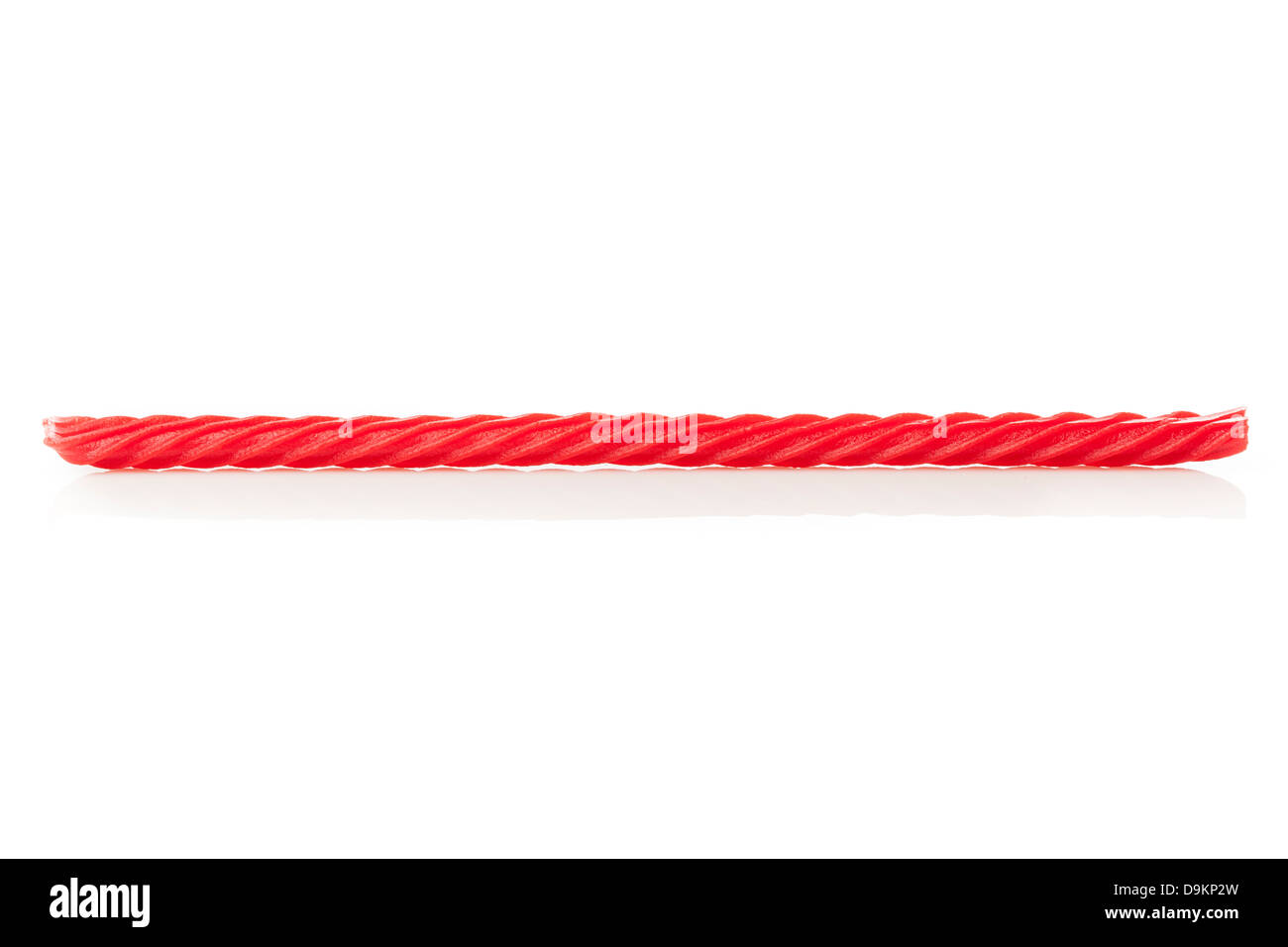 Bright Red Licorice Candy shaped like a twisted rope Stock Photo - Alamy