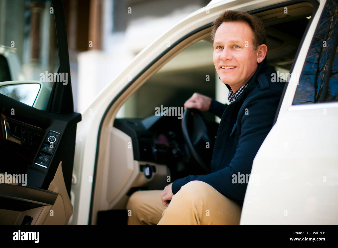 Man pleased to get to destination Stock Photo - Alamy