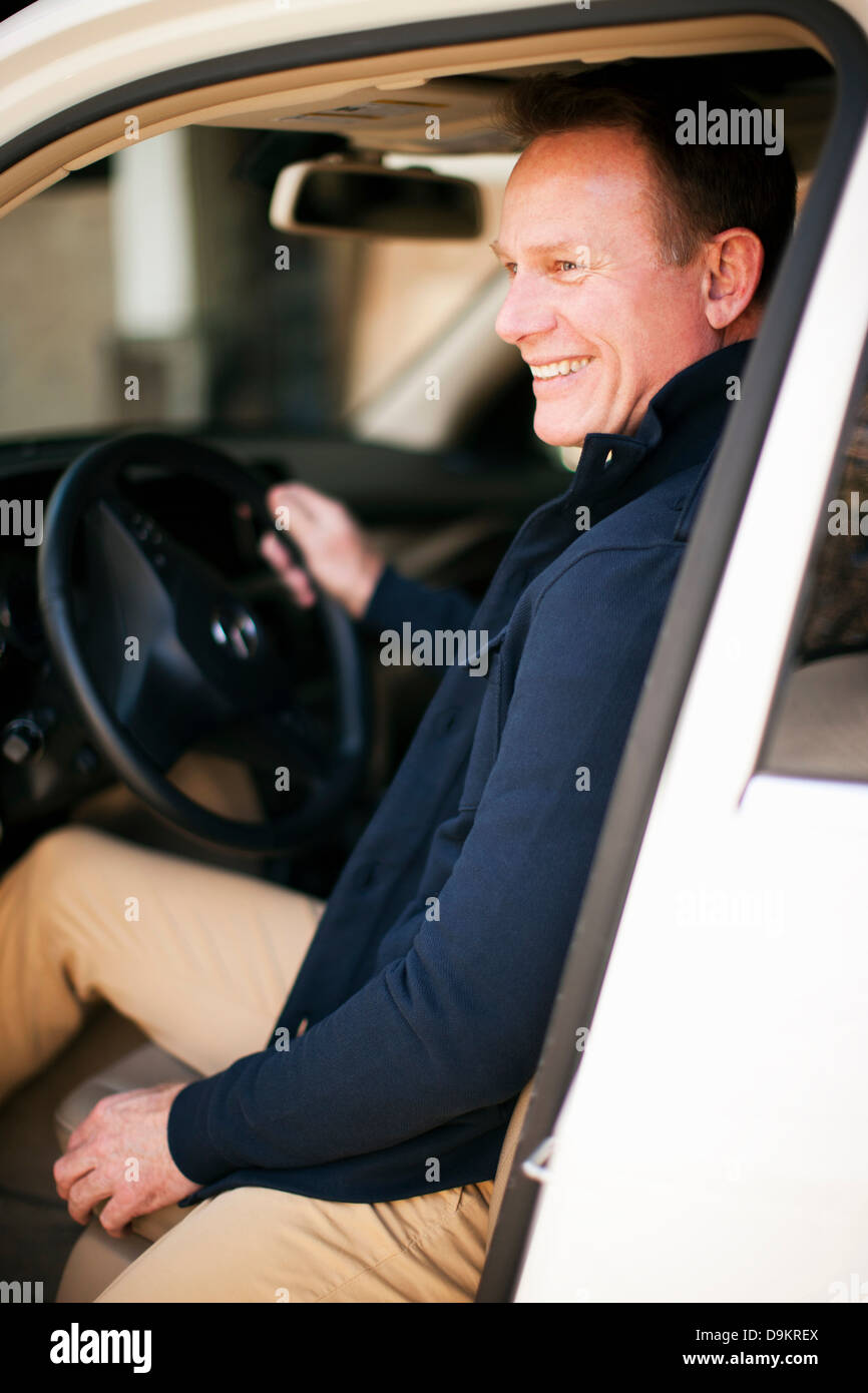 Man pleased to get to destination Stock Photo - Alamy