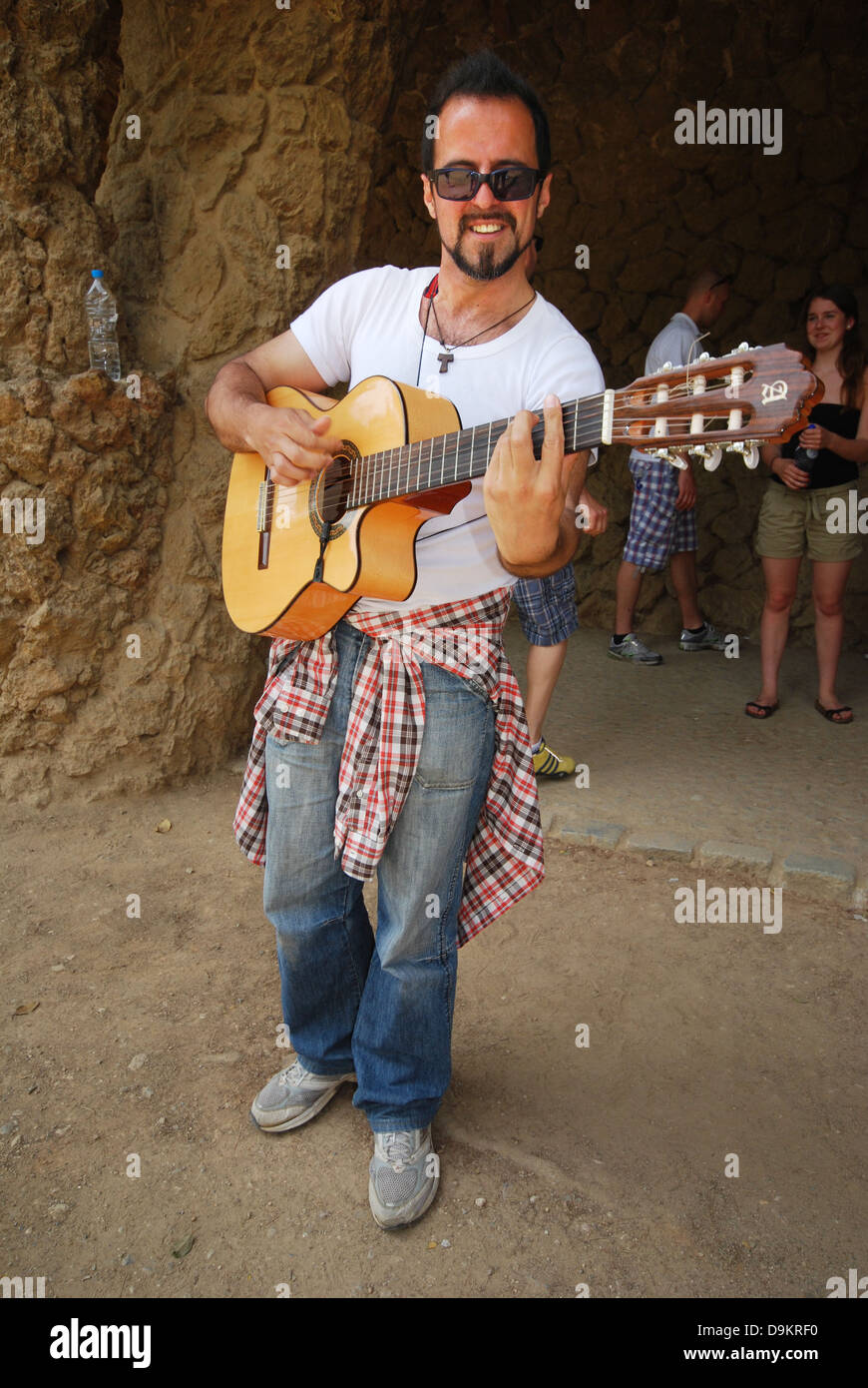 solitary busker in Parc Guell, Barcelona Spain Stock Photo - Alamy