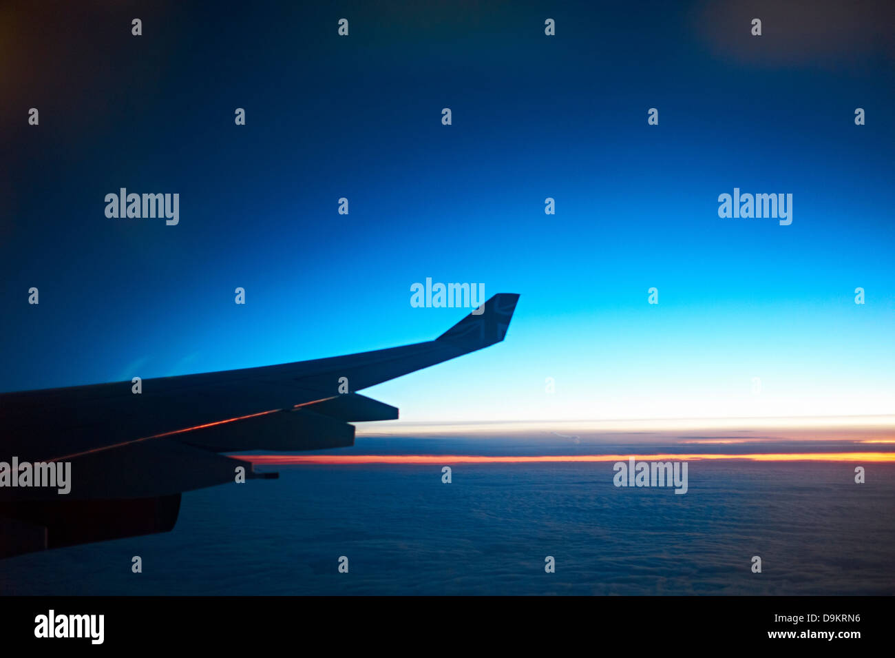 Tip of aeroplane wing in mid air Stock Photo - Alamy