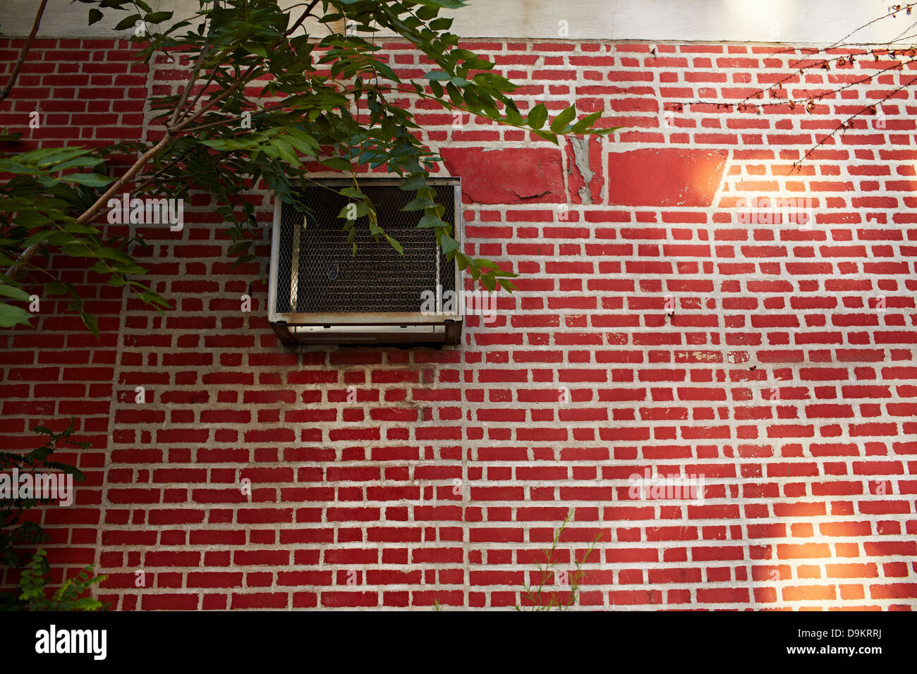 Red brick wall with air vent Stock Photo - Alamy