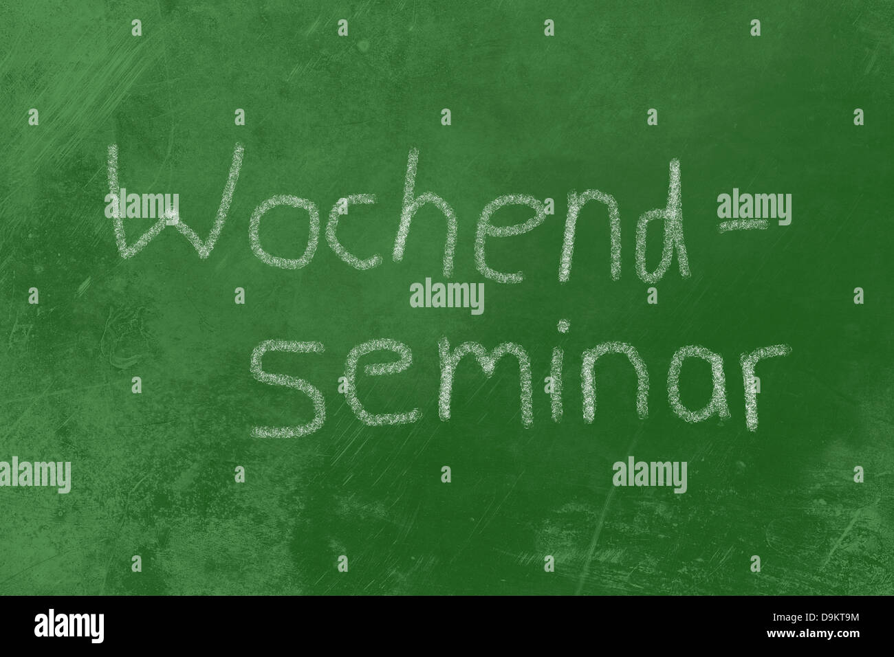 Wochenendseminar (german weekend seminar) written on a blackboard Stock ...