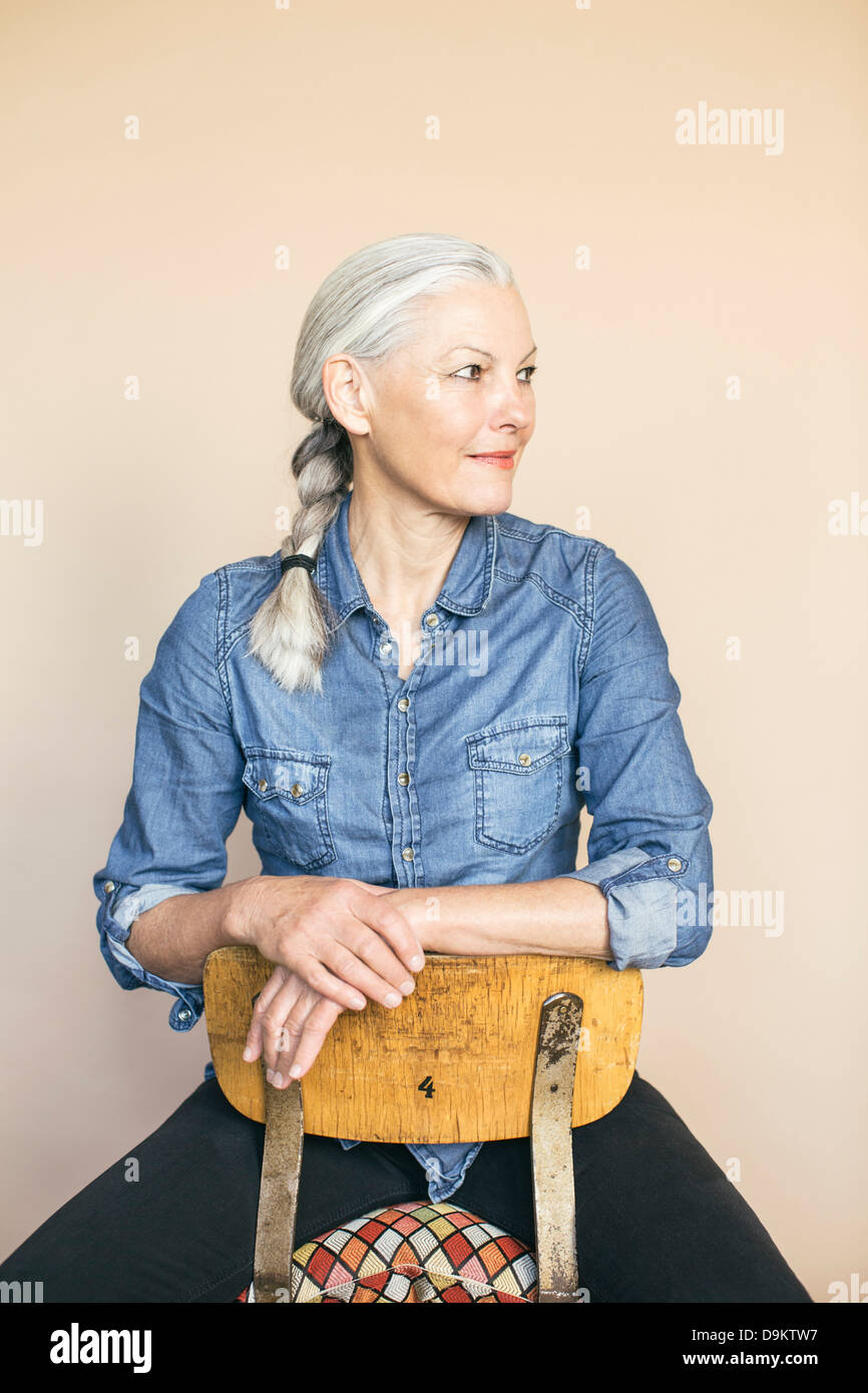 Woman in confident pose Stock Photo - Alamy