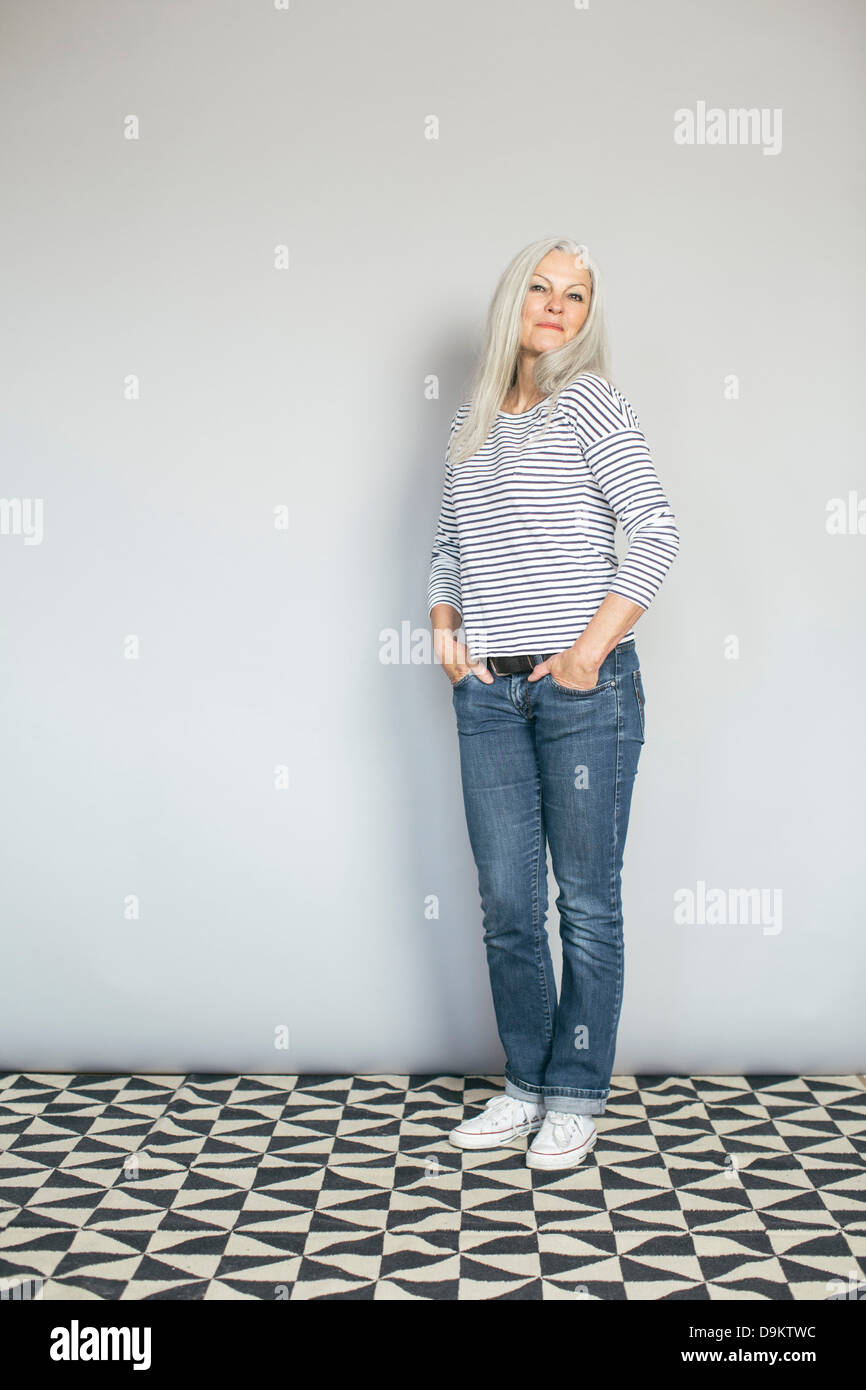 Woman in confident pose Stock Photo - Alamy