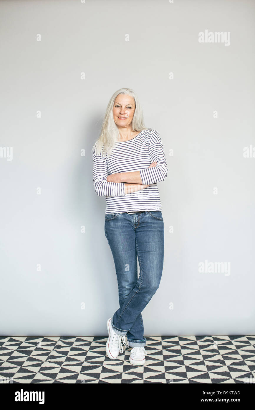 Woman in confident pose Stock Photo - Alamy