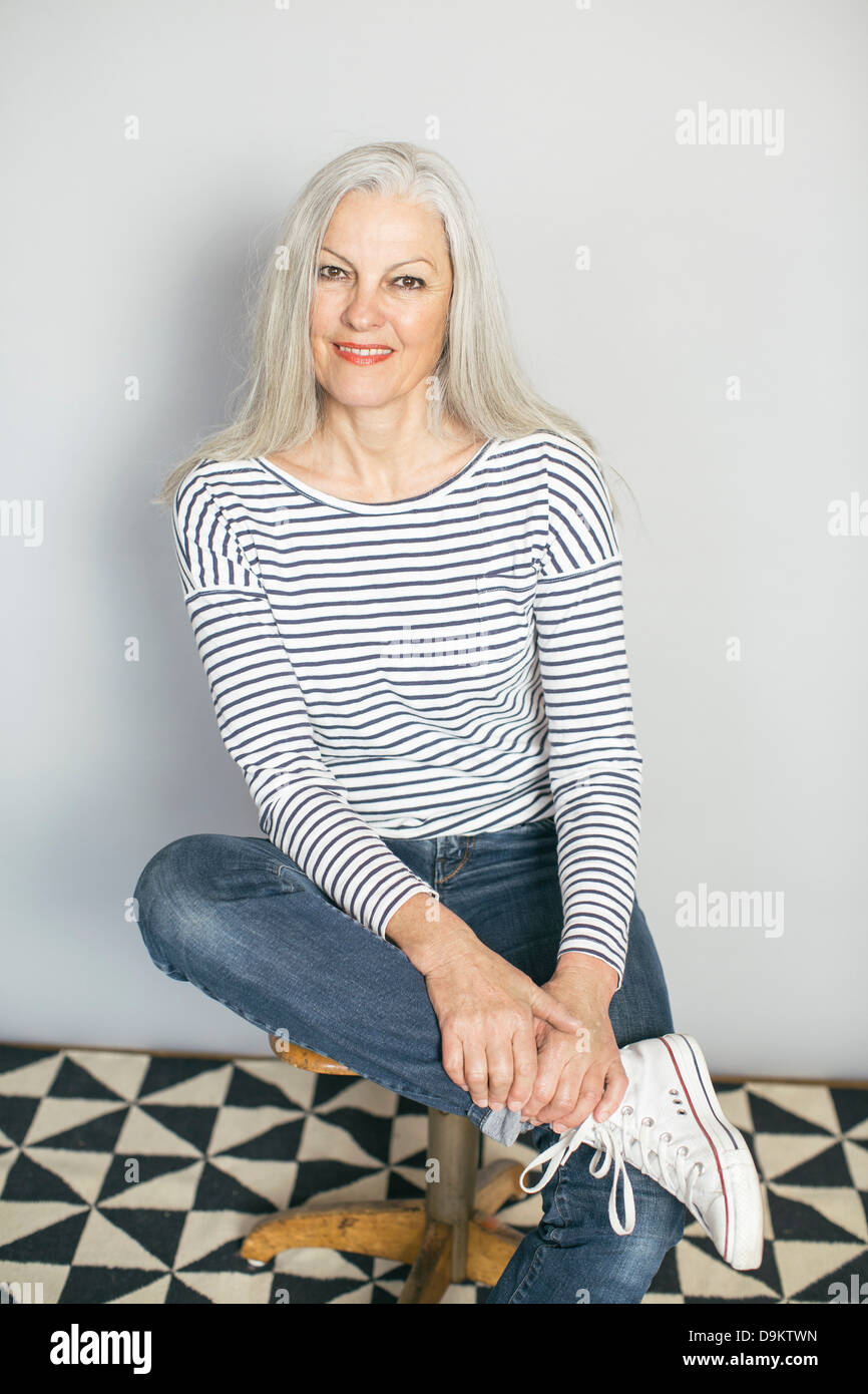 Woman in confident pose Stock Photo - Alamy