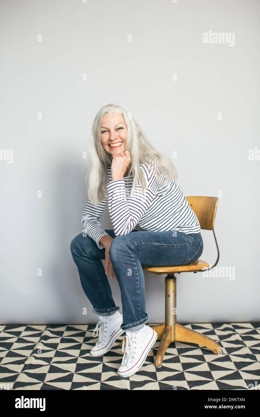 Woman in confident pose Stock Photo - Alamy