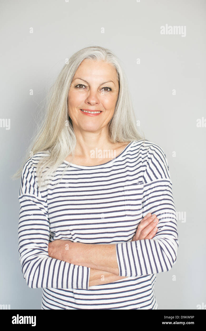 Woman in confident pose Stock Photo - Alamy