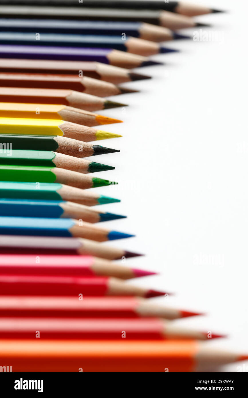 Colored Pencils arranged in arch Stock Photo - Alamy
