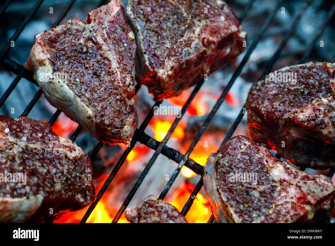Lamb chops sizzle over a mesquite charcoal fire in Santa Monica ...
