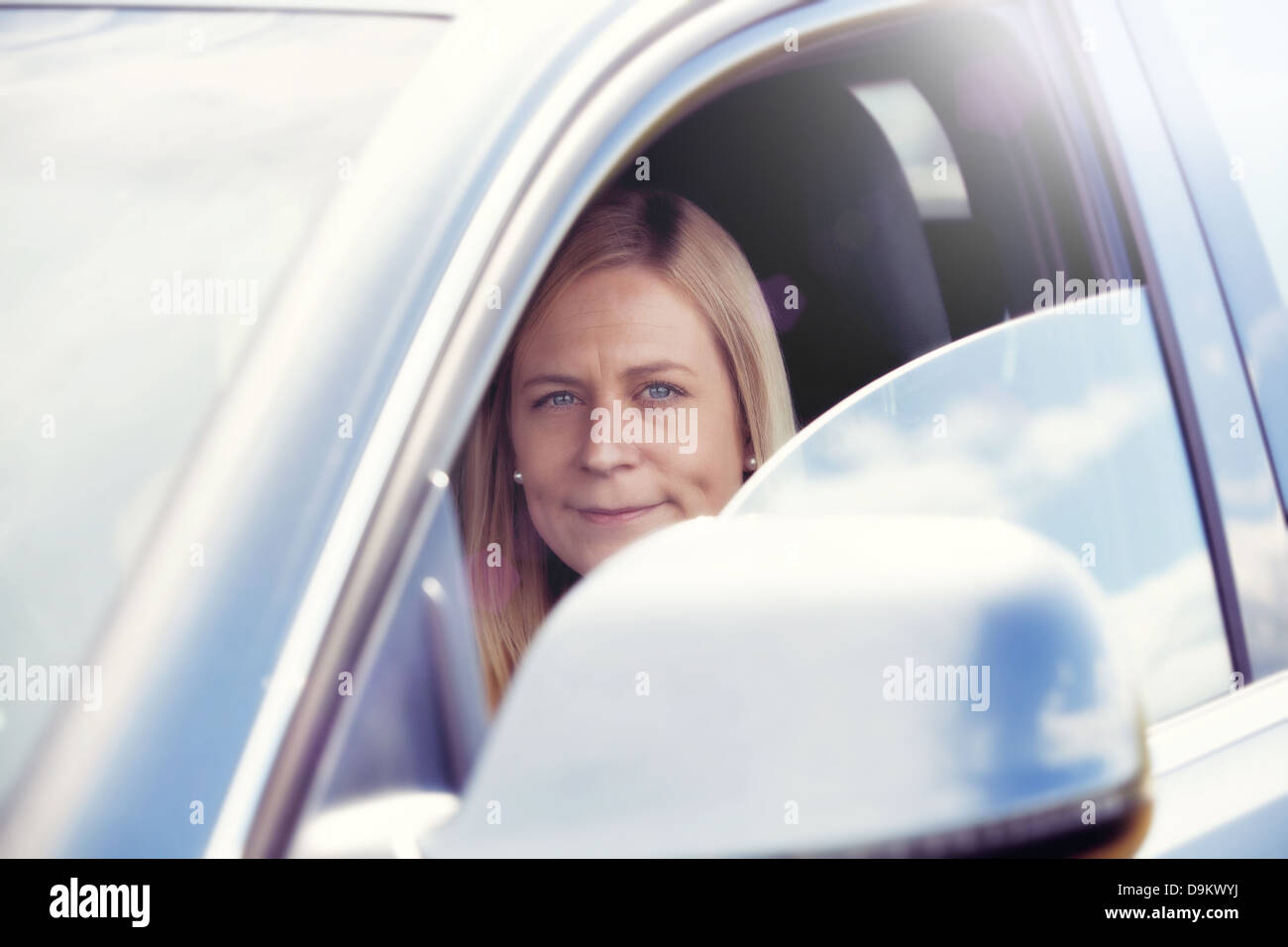 Blonde female driver hi-res stock photography and images - Alamy