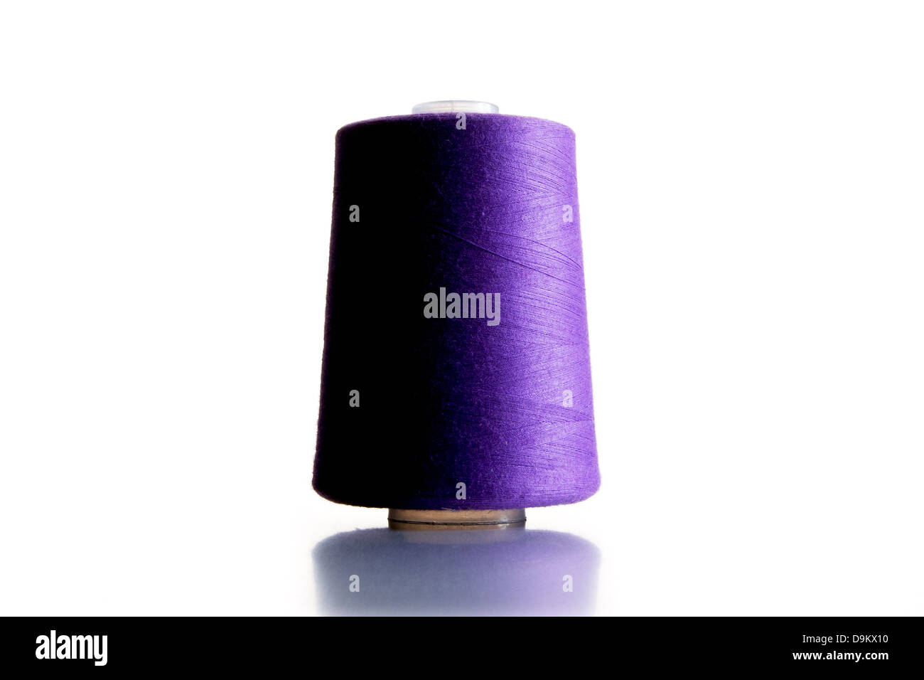 Purple Spool of Thread Stock Photo - Alamy