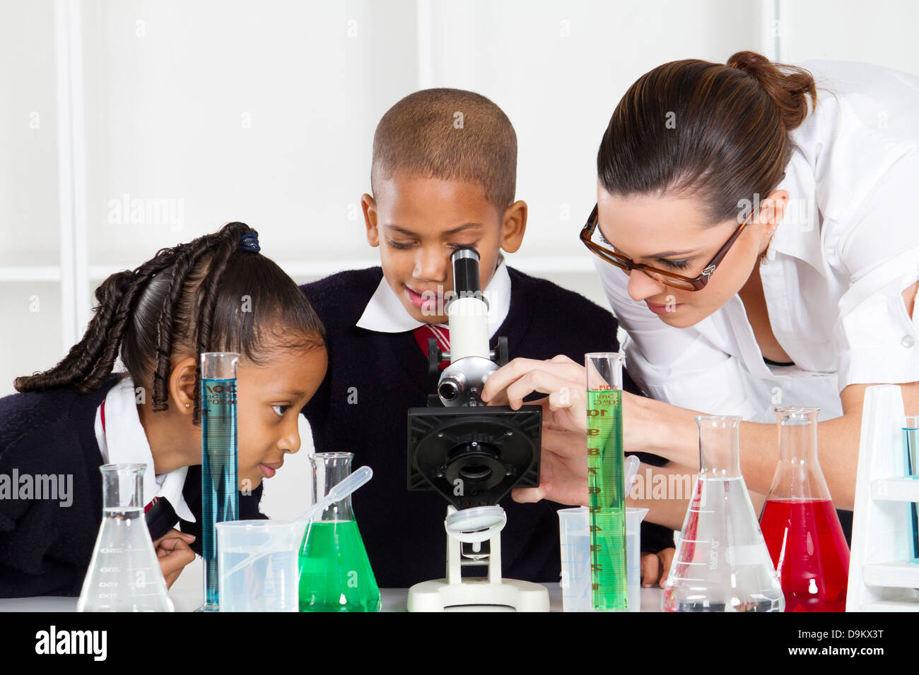 Kid science uniform hi-res stock photography and images - Alamy