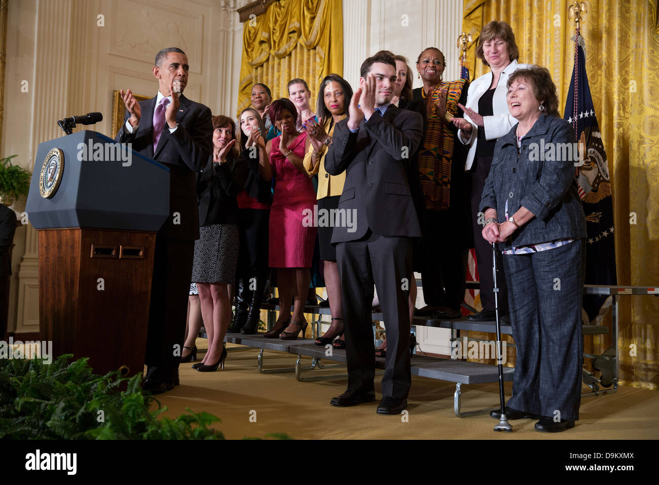 US President Barack Obama recognizes Natoma Canfield, right, during a ...