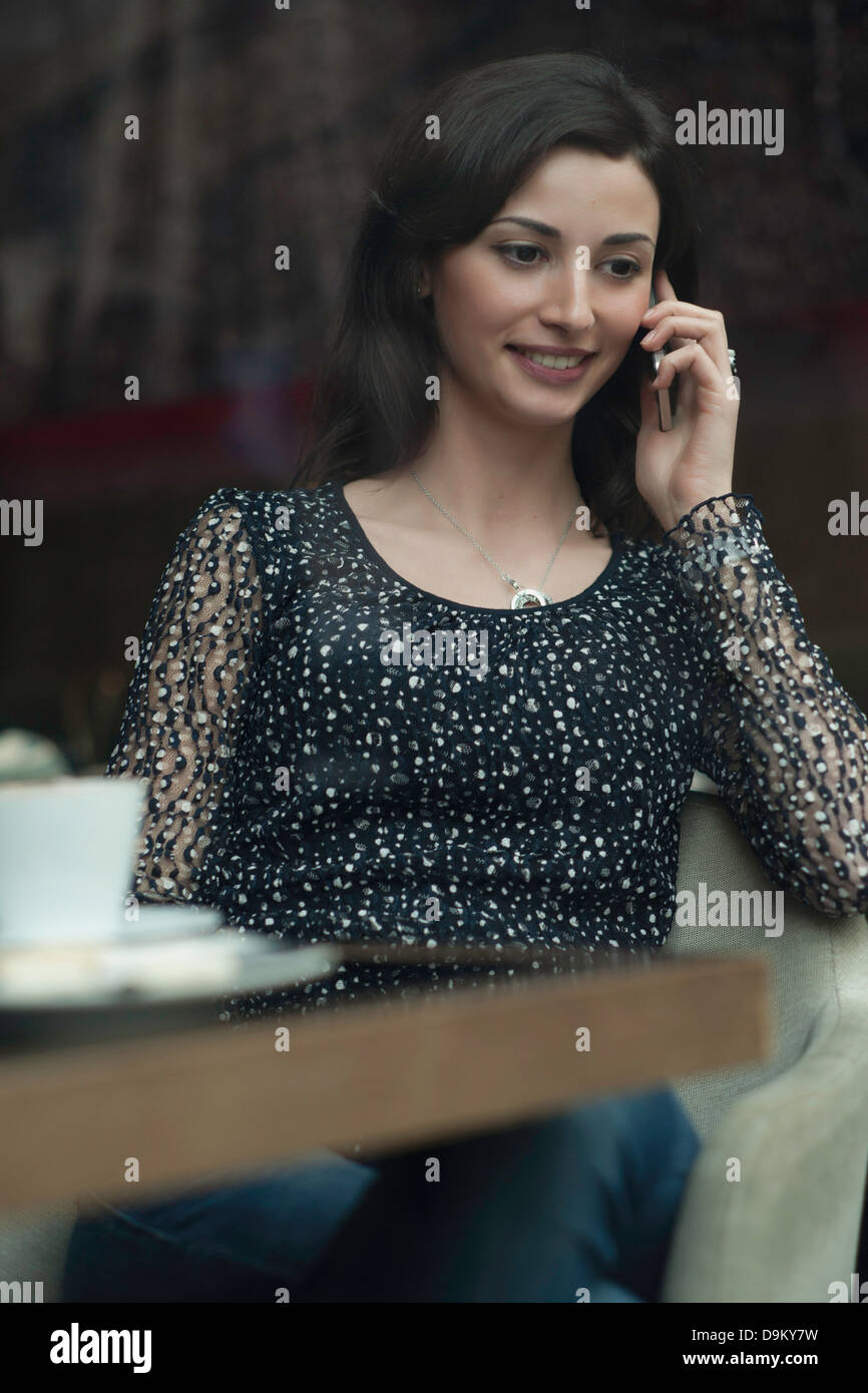 Young woman as cell phone hi-res stock photography and images - Alamy